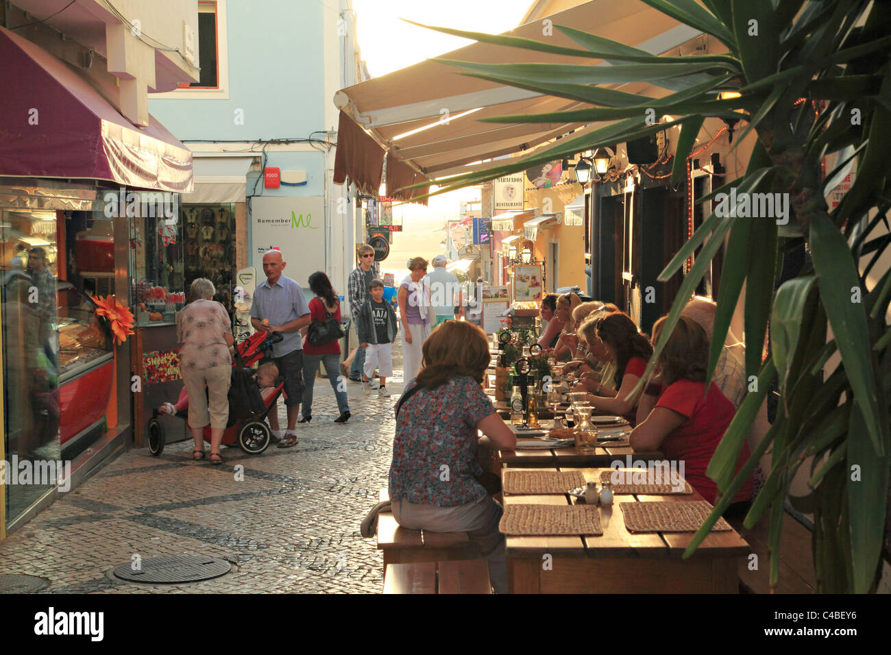 Alvor street and restaurants Algarve Portugal Stock Photo - Alamy