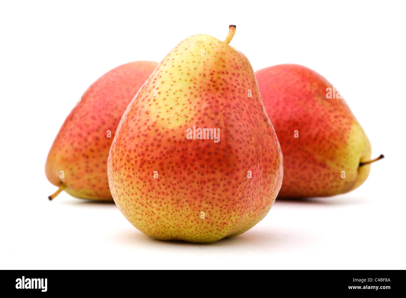 Three pears, arranged in a group, isolated, white background Stock ...