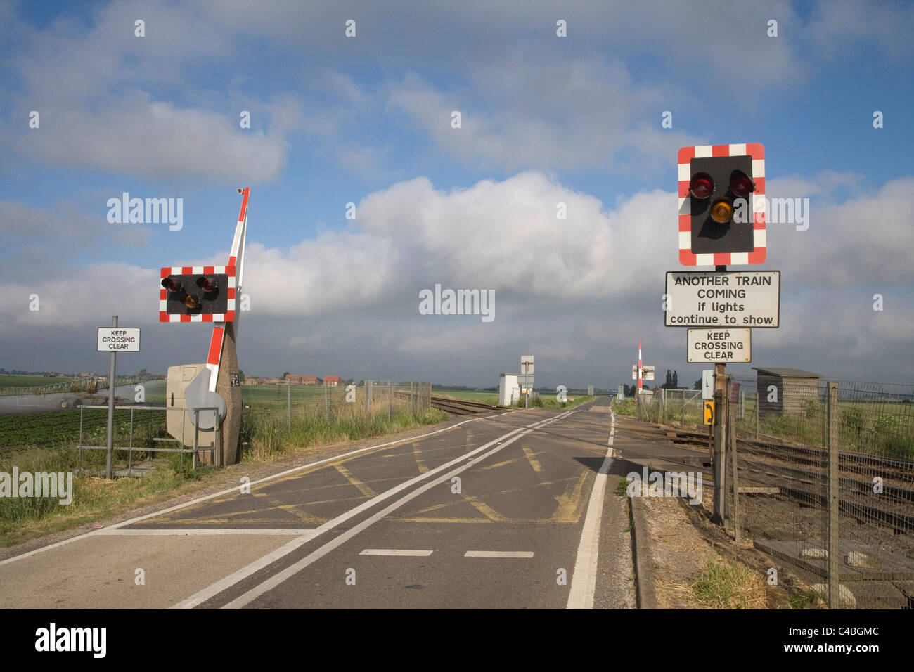 unmanned level crossing on the cambridgeshire fens Stock Photo - Alamy