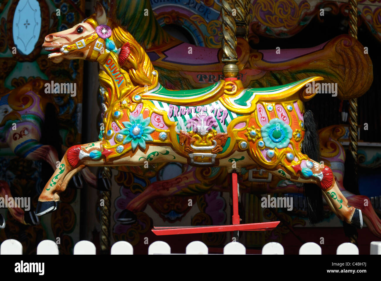 Carousel horse on the fairground at the end of the pier. Brighton. East ...