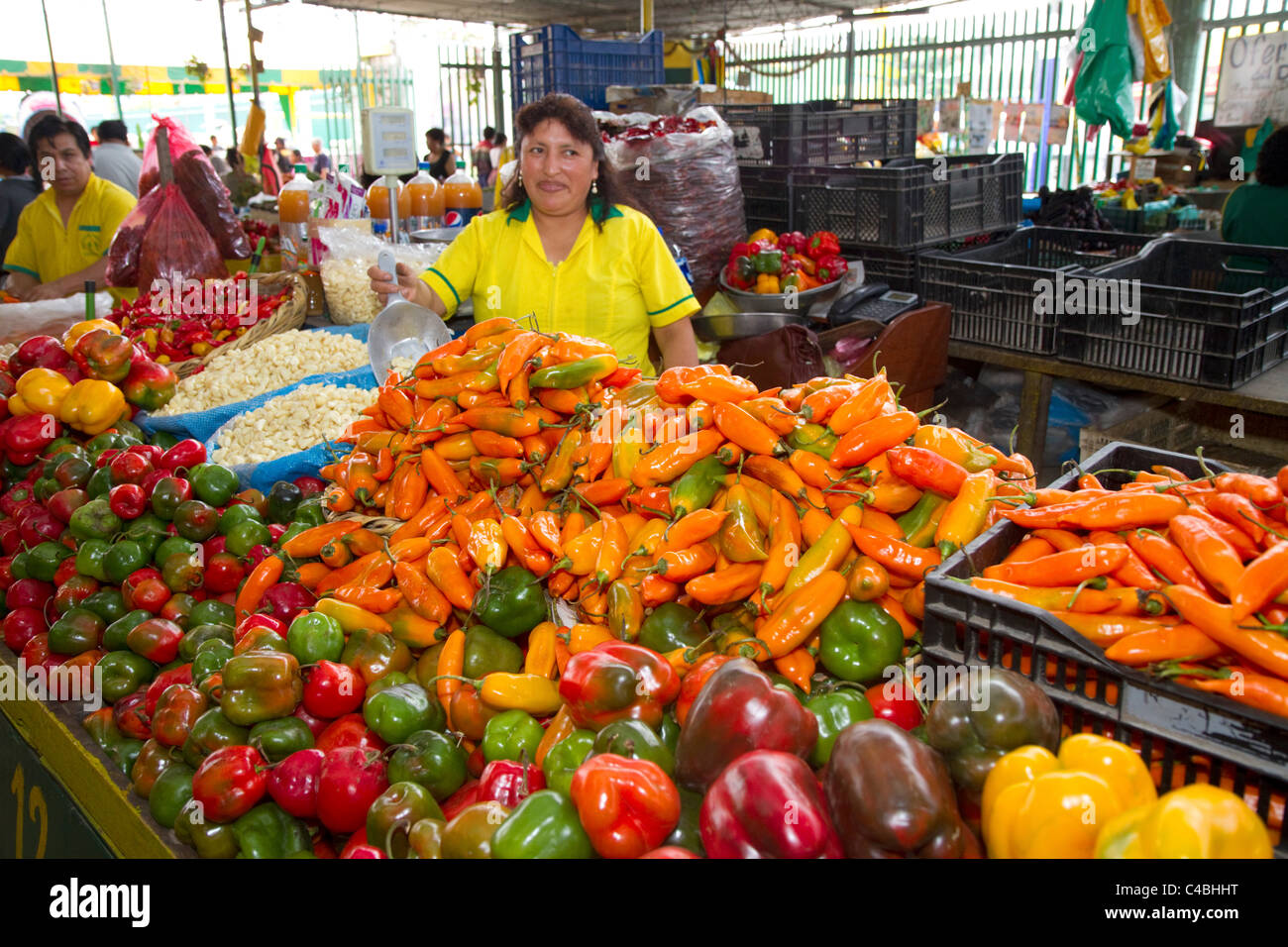 Vendor at a cooperative produce market in the Chorrillos district of ...