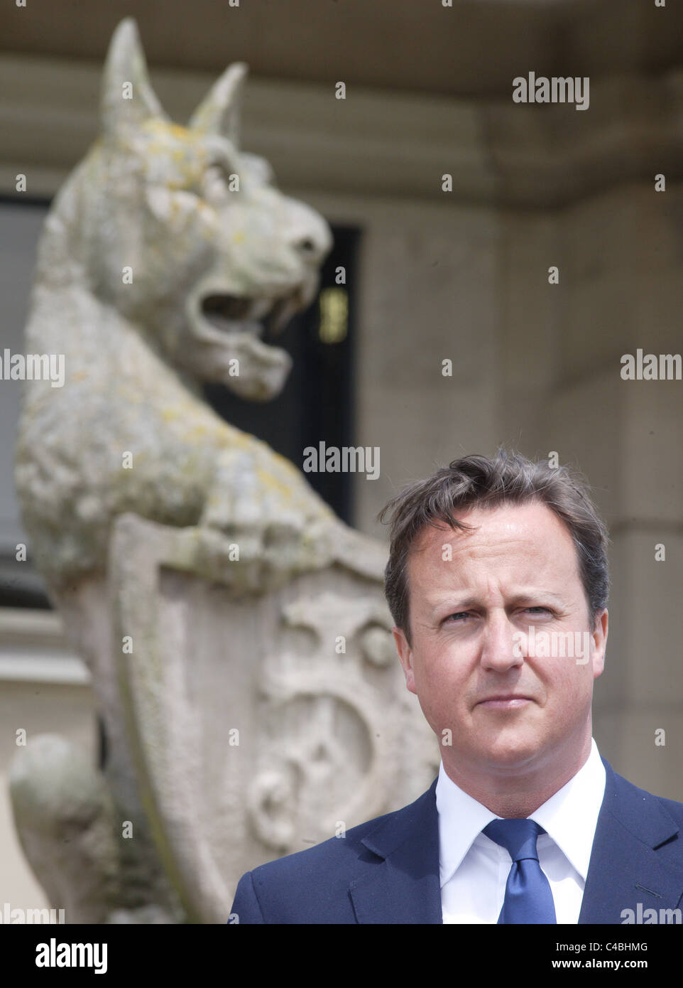 Britain's David Cameron speaks to the media outside Stormont Castle ...