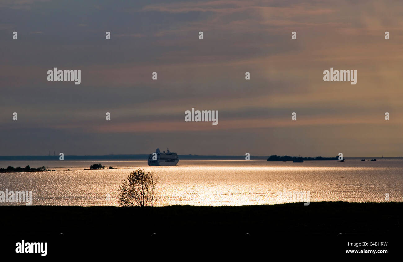 ship at sea at sunset Stock Photo - Alamy