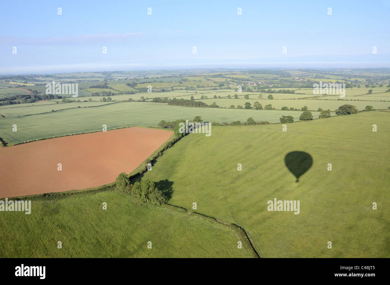 Balloon shadow on the landscape Stock Photo - Alamy