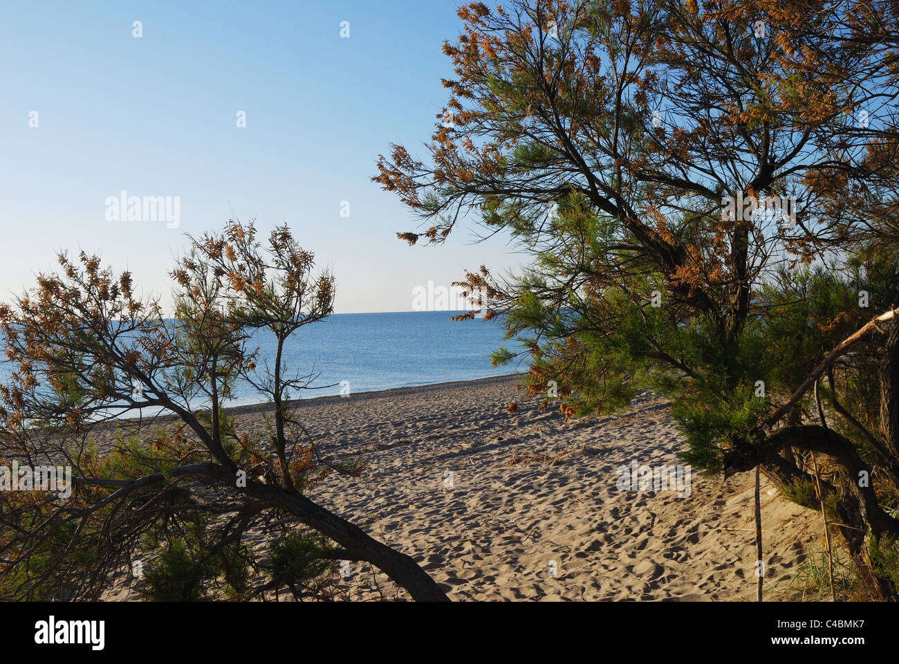 Mediterranean sun rise on beach Stock Photo - Alamy