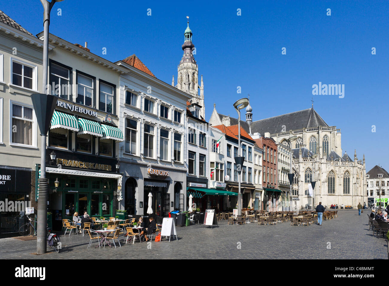 Sidewalk cafes in the Grote Markt (Main Square) with the Grote Kerk ...