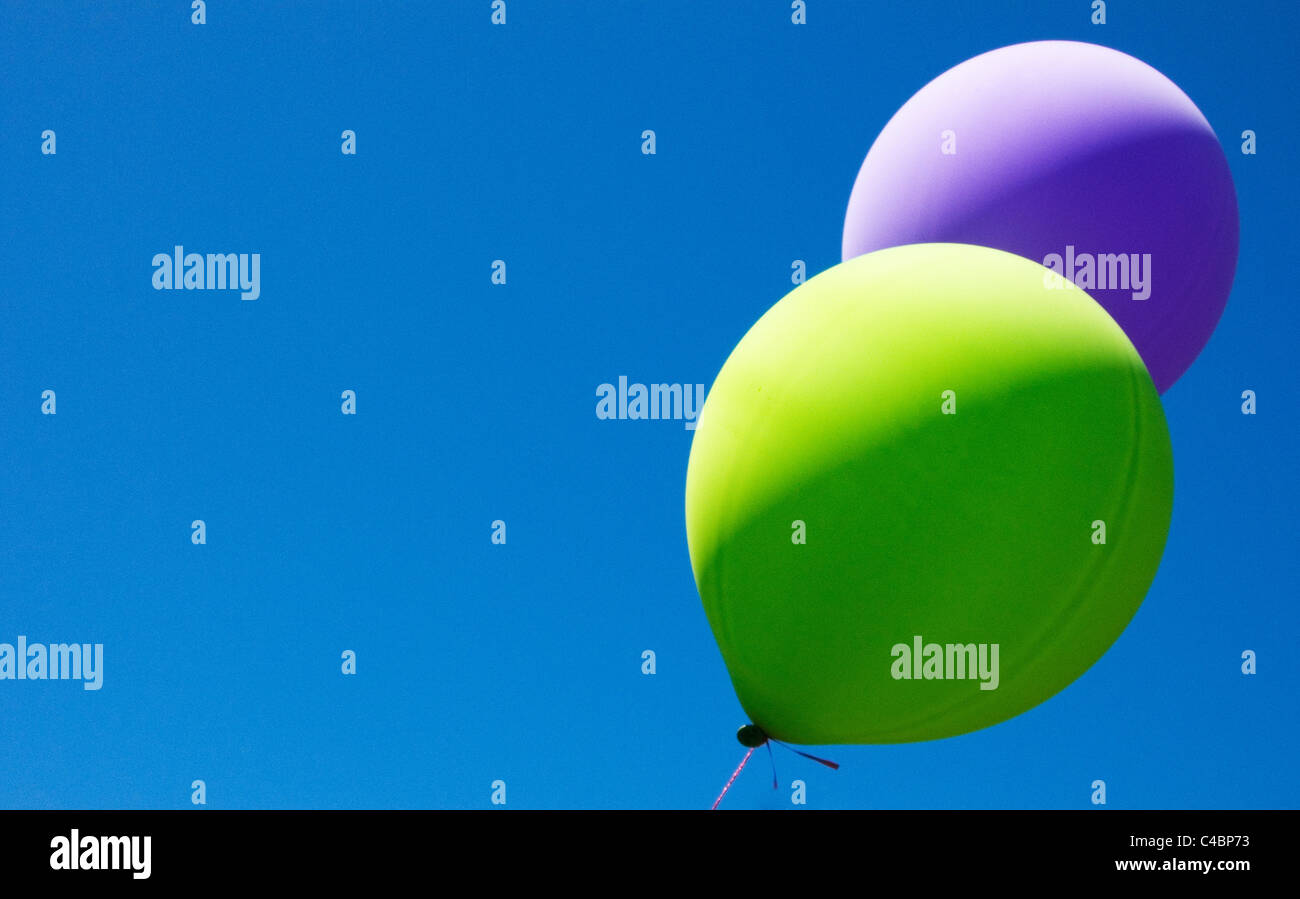 balloons blowing in the wind Stock Photo - Alamy
