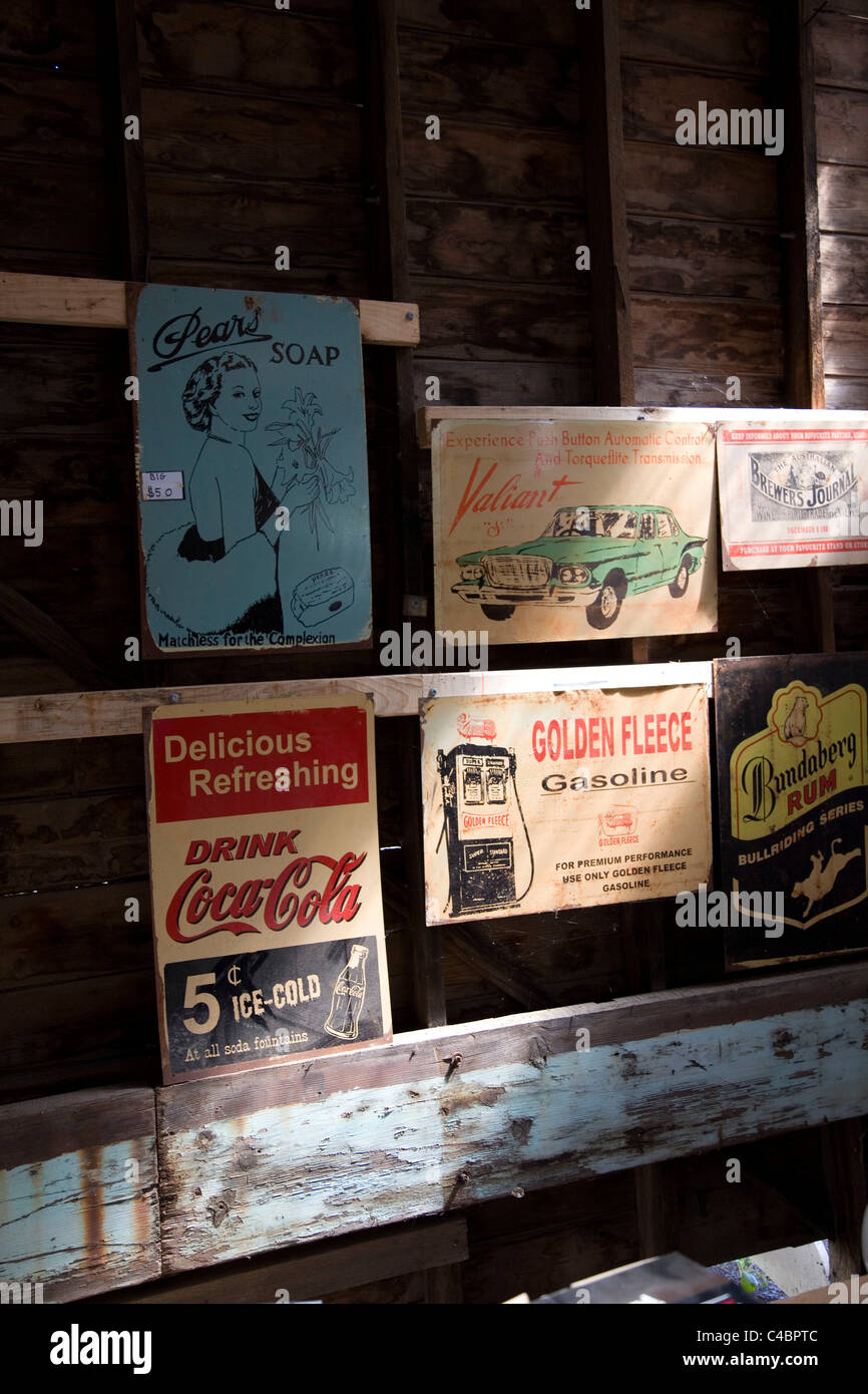 Old Australian advertising signs for sale in a junk shop in Maldon ...