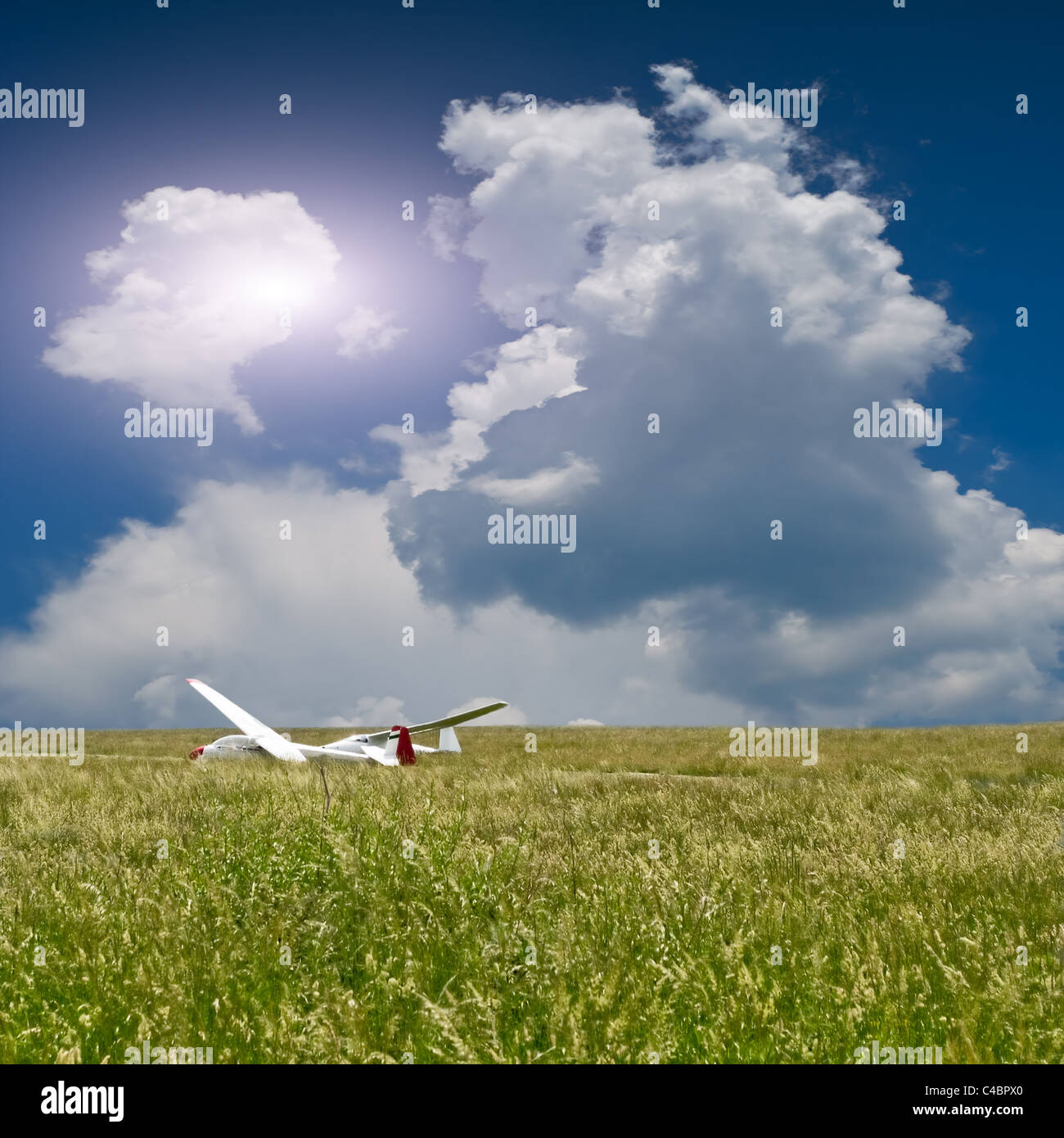 Two gliders on a small airfield with cloudy sky Stock Photo - Alamy