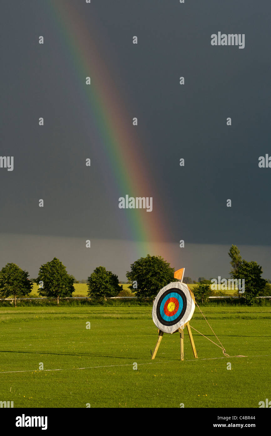 Archery target pictured at the end of a rainbow Stock Photo - Alamy