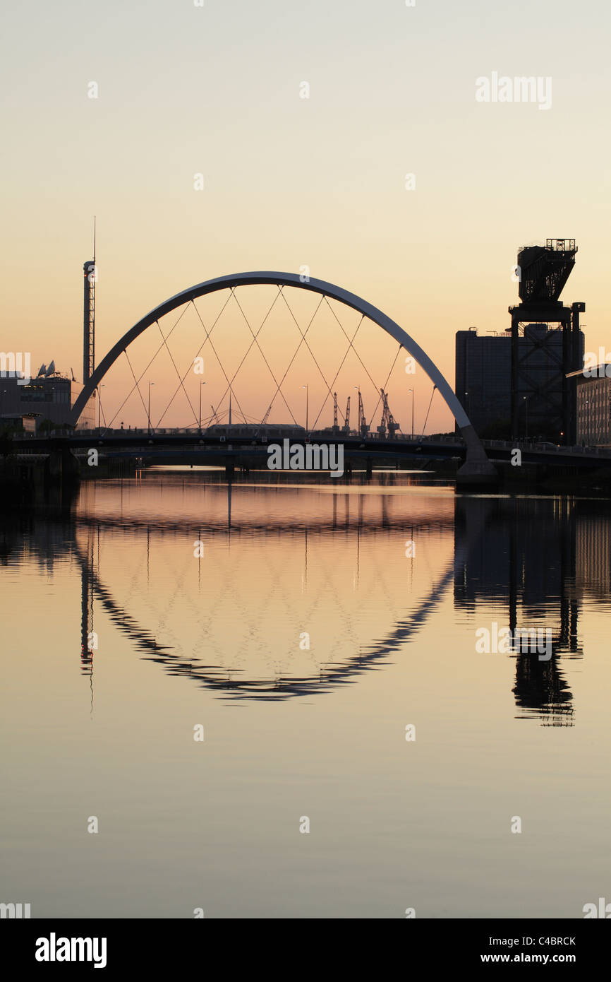 Clyde Arc Bridge Glasgow at sunset, looking west along the River Clyde ...