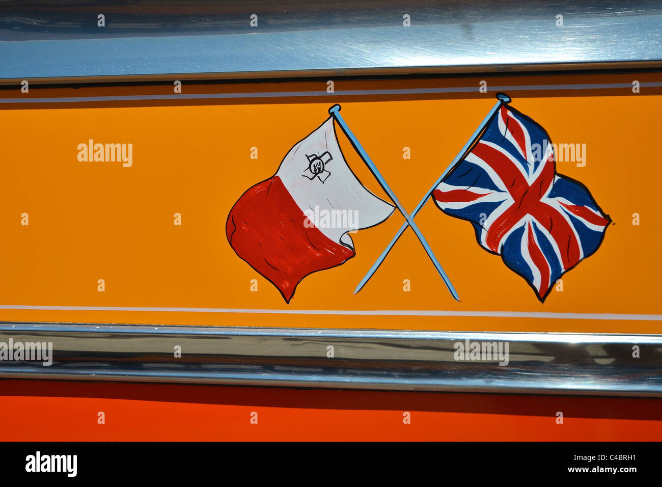 Crossed British and Maltese flags painted on the side of a classic ...