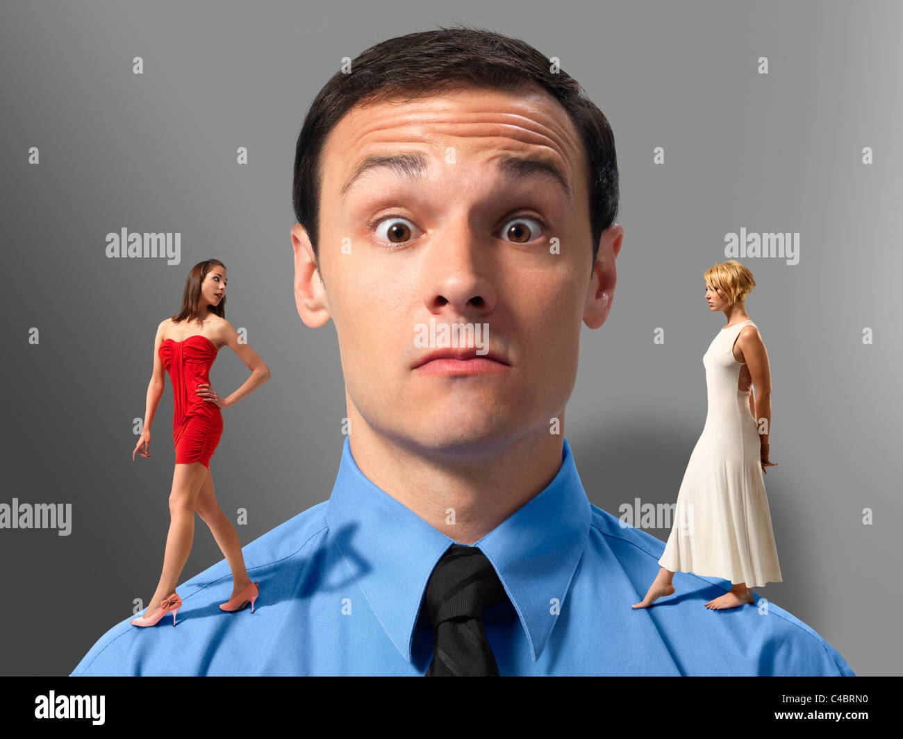 Businessman facing temptation symbolized by angel and devil versions of ...