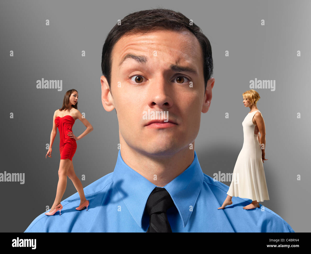 Businessman facing temptation symbolized by angel and devil versions of ...