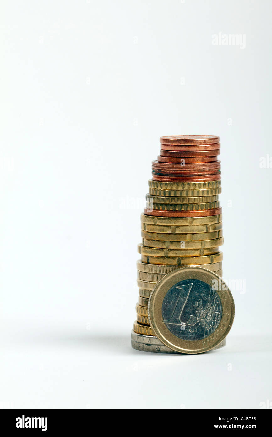 Stack of Euros with single Euro in front Stock Photo - Alamy