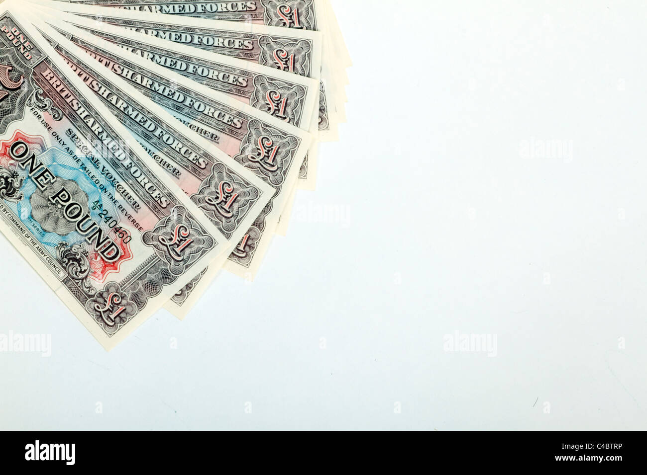 A pile of British Armed Forces One pound notes fanned out Stock Photo ...