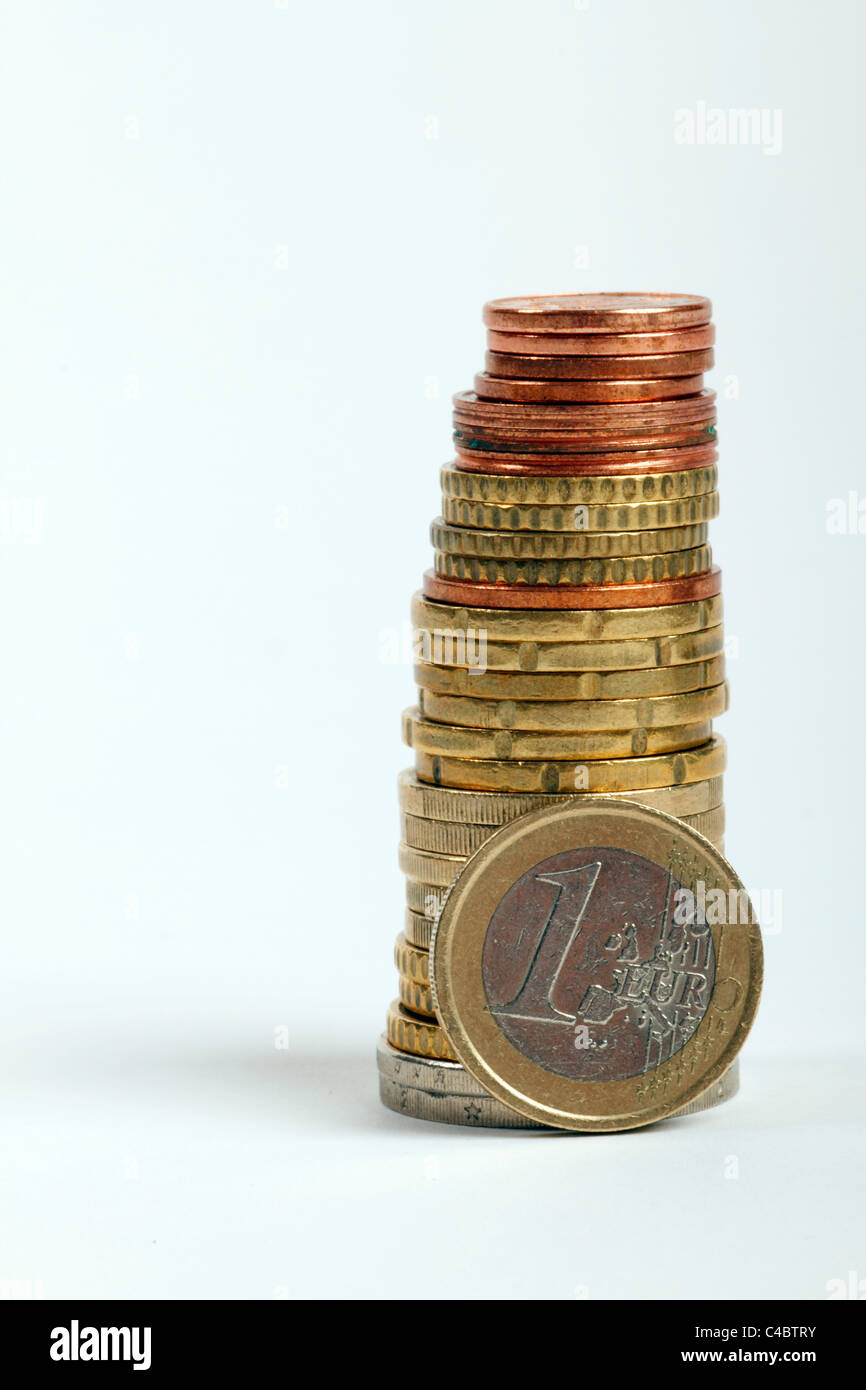 Stack of Euros with single Euro in front Stock Photo - Alamy