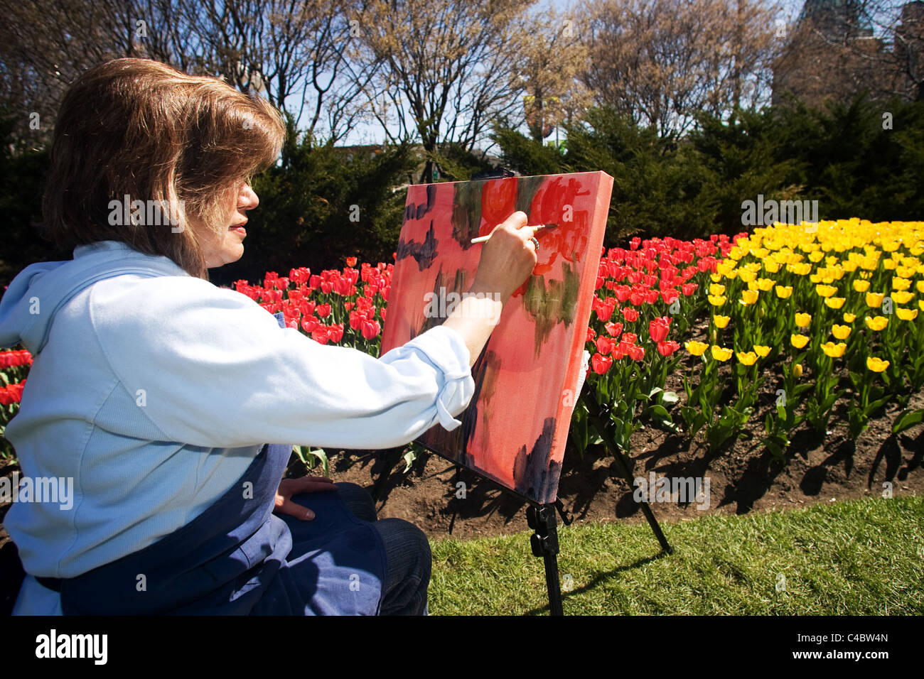 May 2011, Ottawa artist Lina Yachnin works on an oil painting during ...