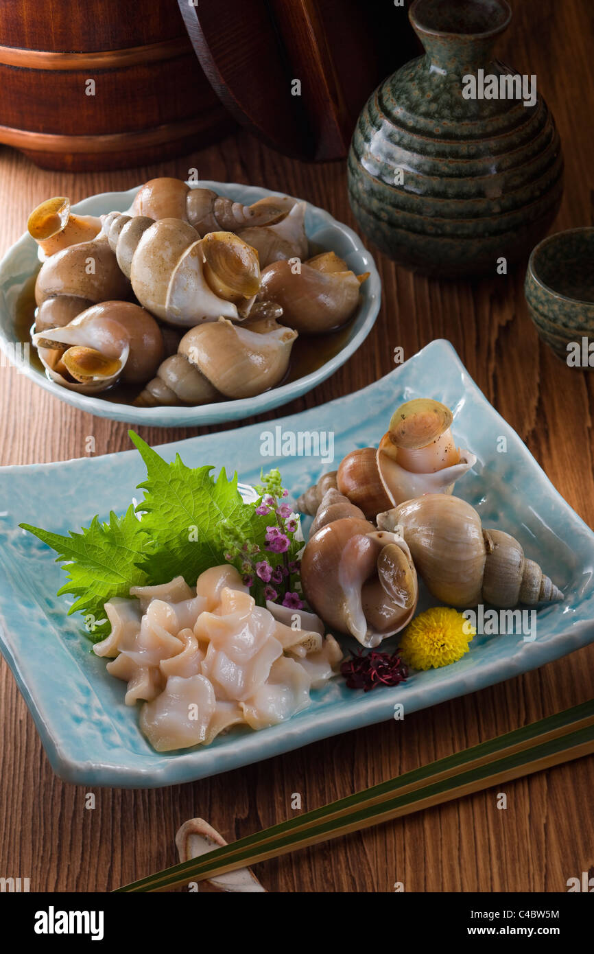 Sashimi of bai-gai and Baigai-no-nimono Stock Photo - Alamy