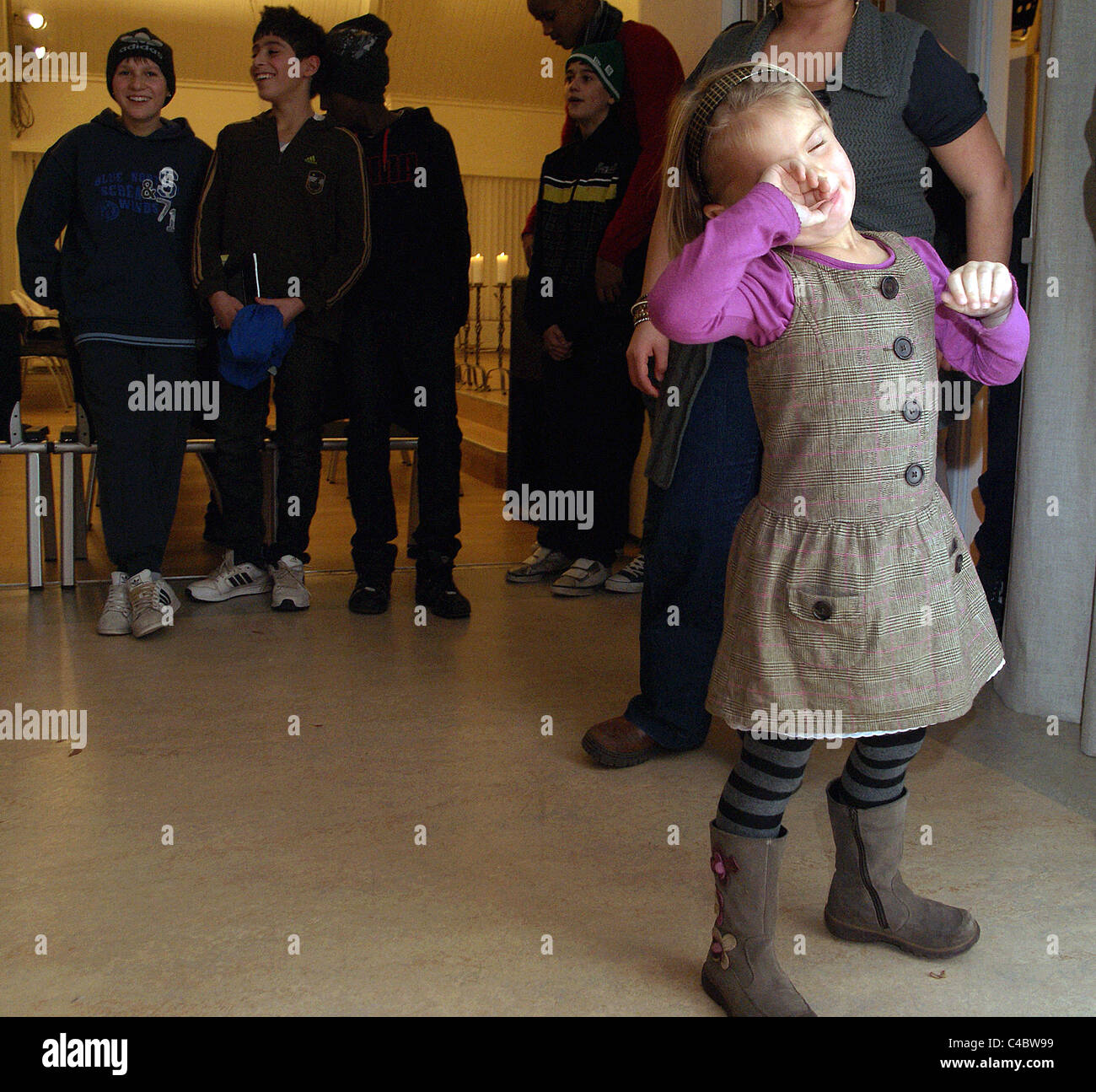 Young girl feeling tired after a long multicultural party Stock Photo ...