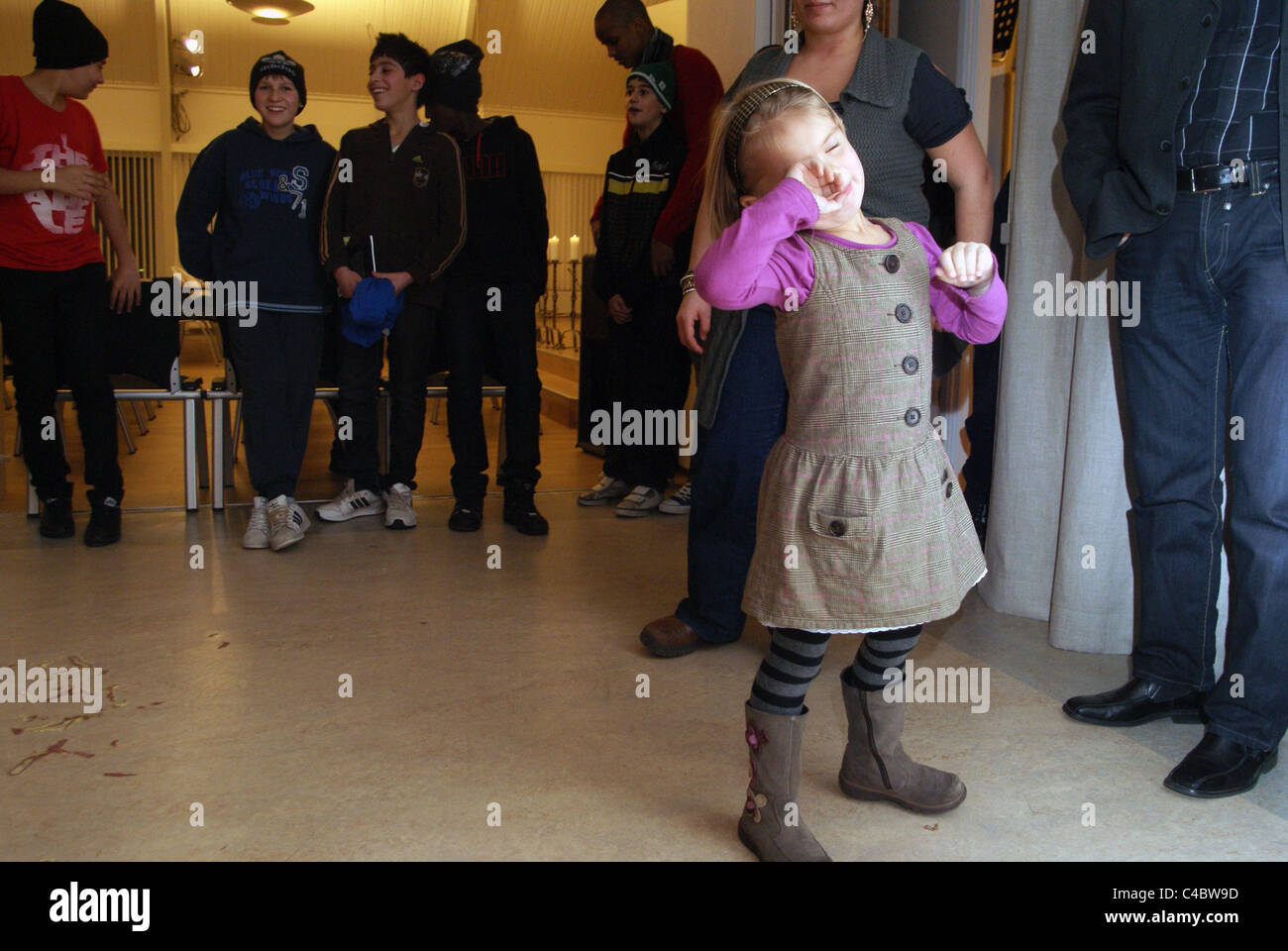 Young girl feeling tired after a long multicultural party Stock Photo ...