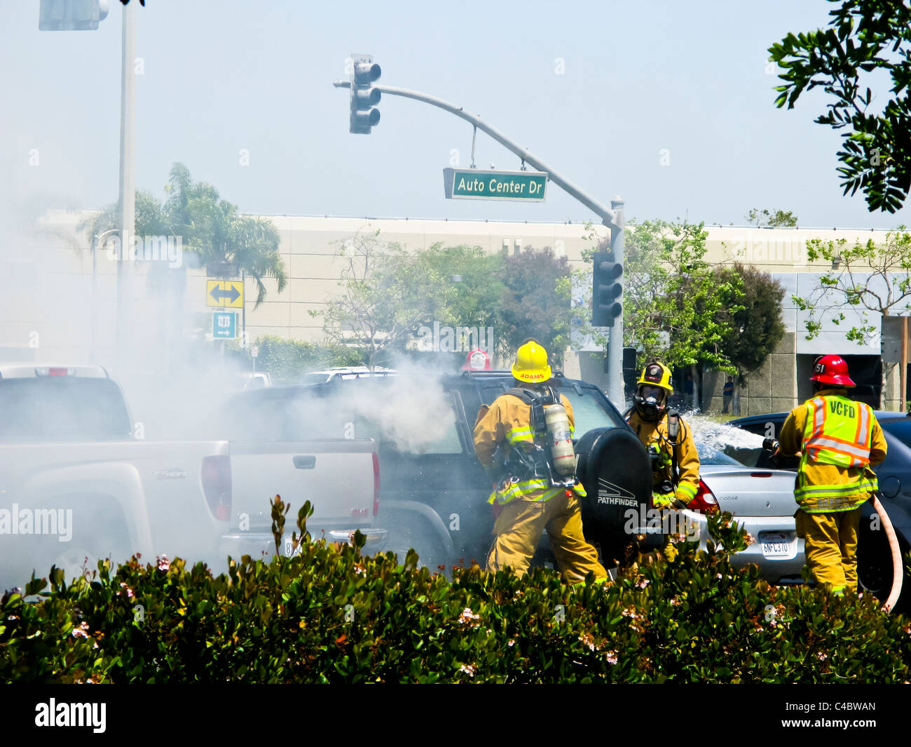 Firefighters working on an SUV fire in Oxnard California Stock Photo ...