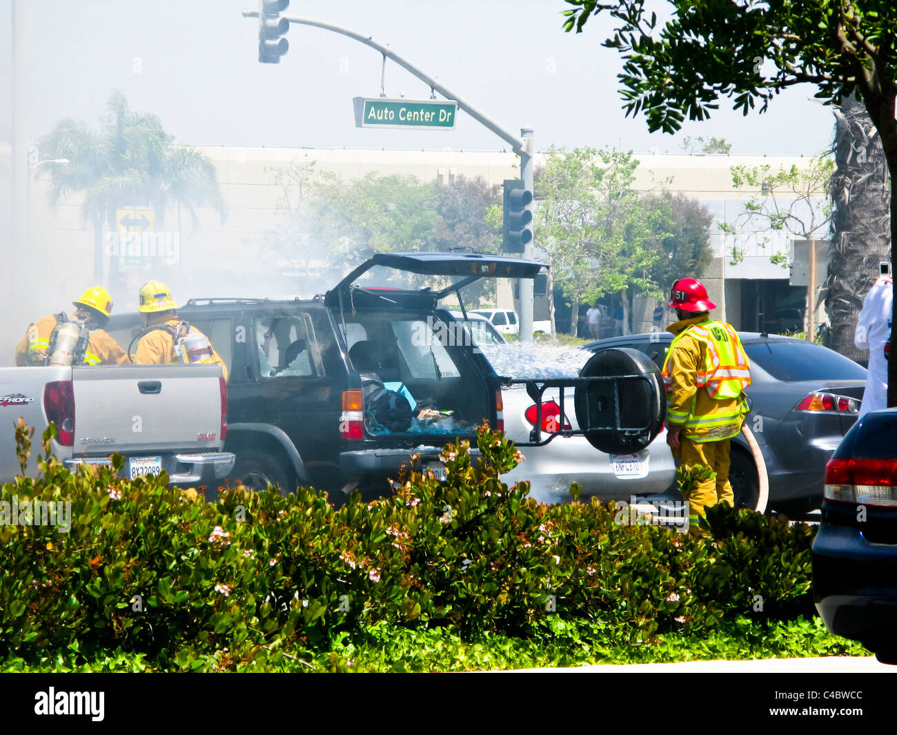 Firefighters working on an SUV fire in Oxnard California Stock Photo ...