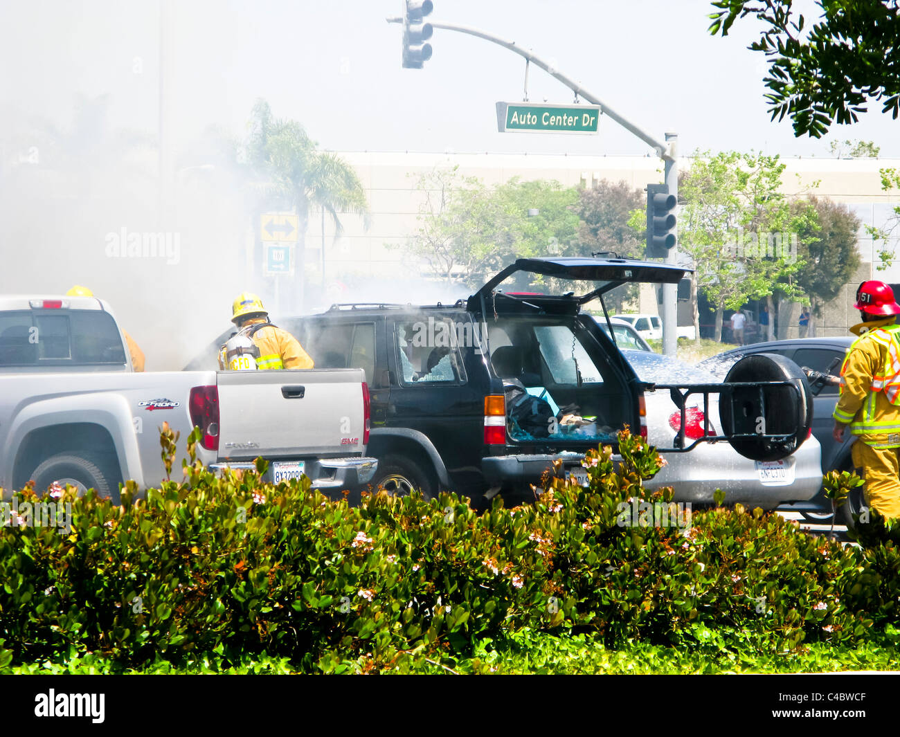 Firefighters working on an SUV fire in Oxnard California Stock Photo ...