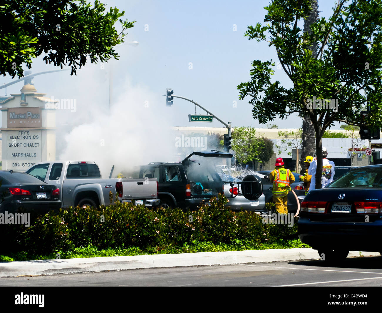 Firefighters working on an SUV fire in Oxnard California Stock Photo ...