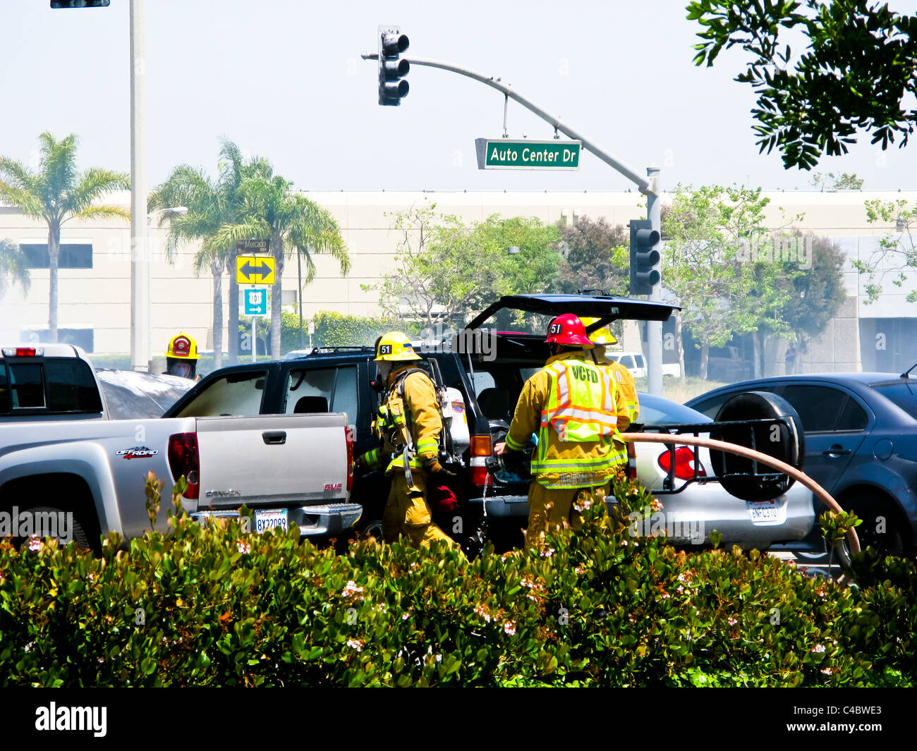Firefighters working on an SUV fire in Oxnard California Stock Photo ...