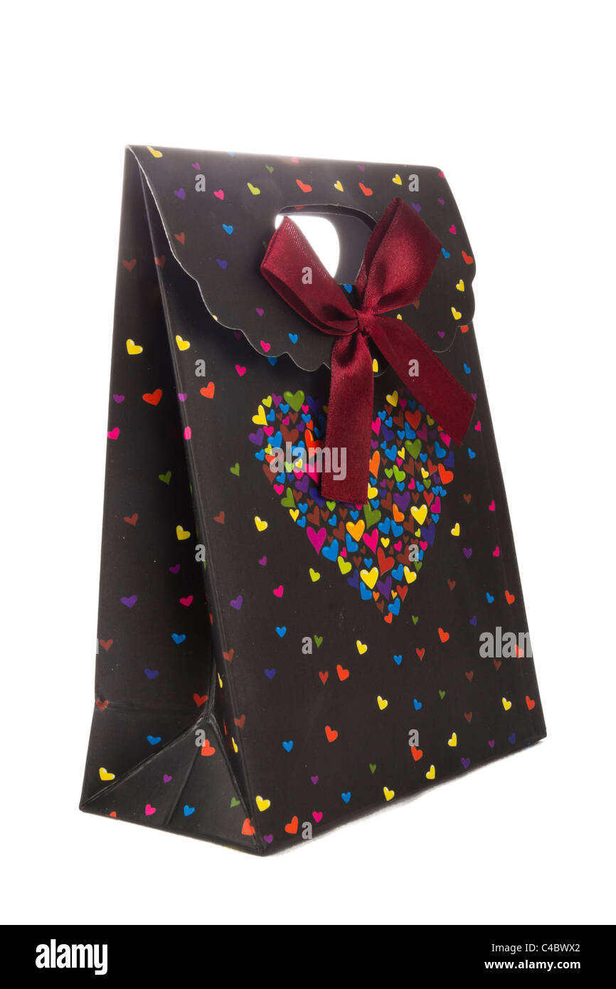 a colorful gift bag isolated on white Stock Photo - Alamy
