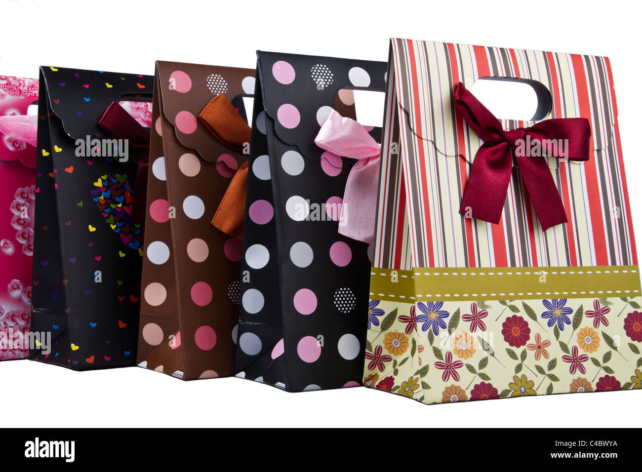 Bunch colorful paper bags for gifts isolated on white Stock Photo - Alamy