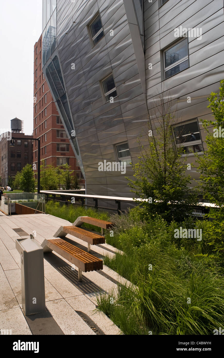Photography of a park bench at a metal facade hi-res stock photography ...
