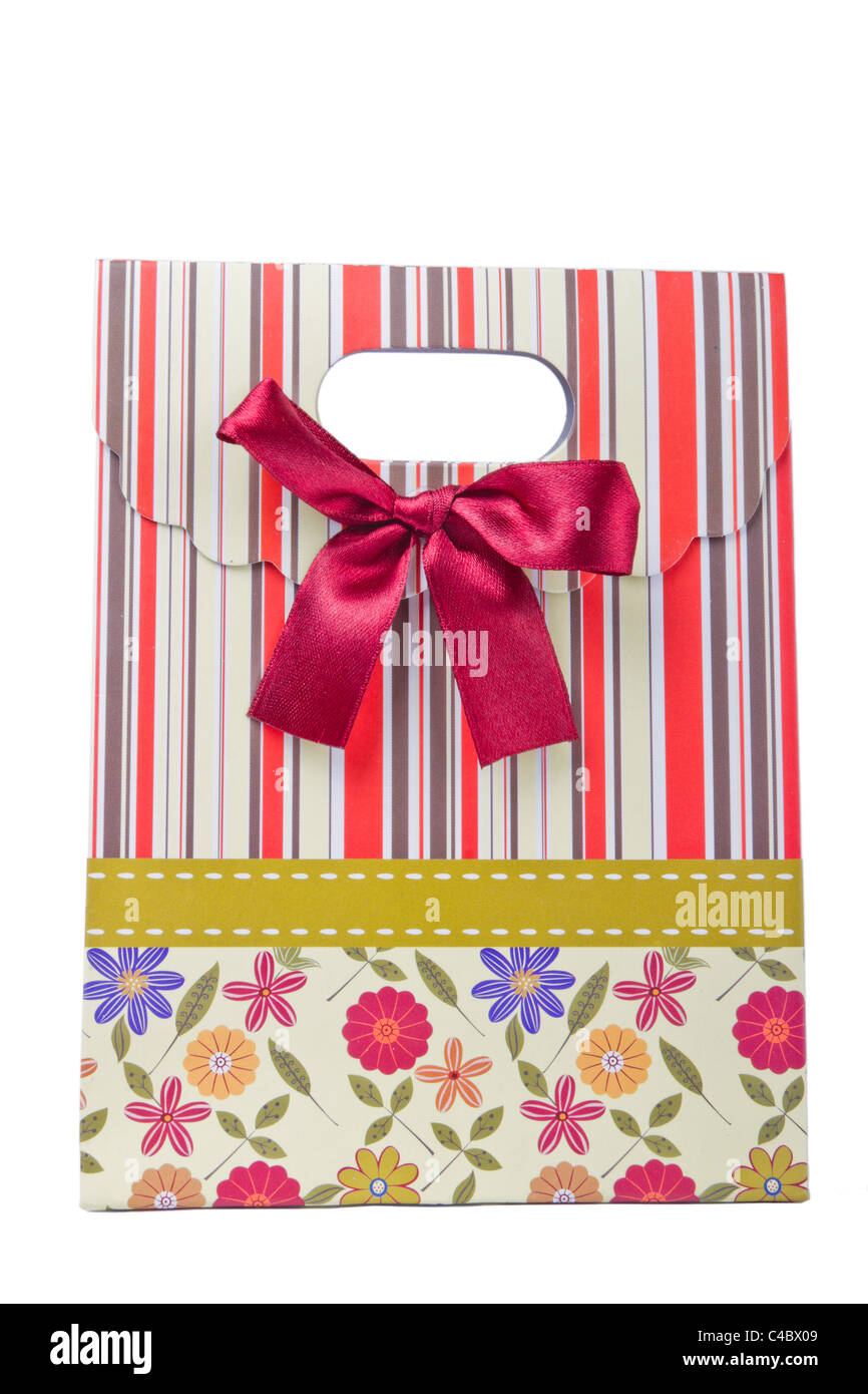 a colorful gift bag isolated on white Stock Photo - Alamy