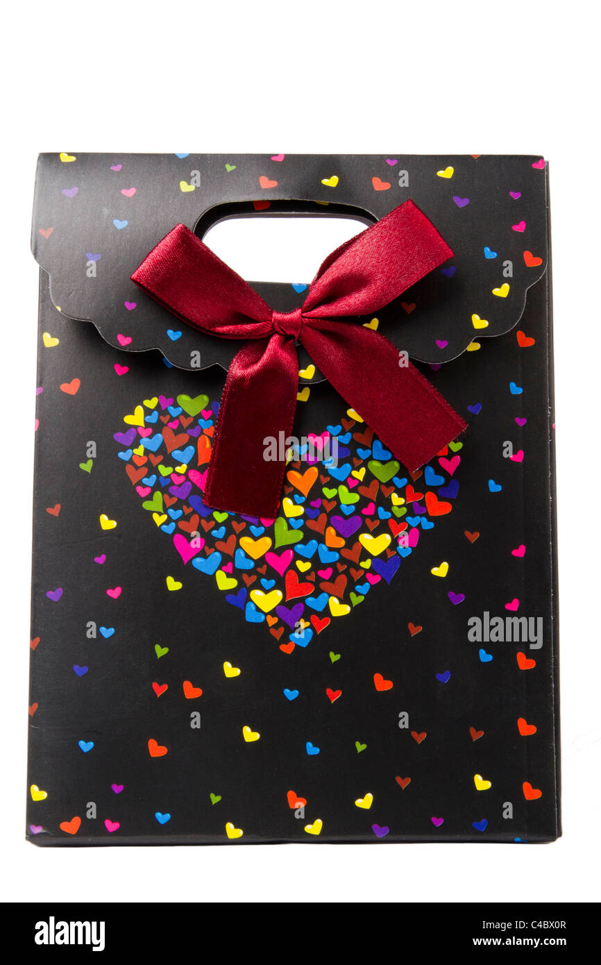 a colorful gift bag isolated on white Stock Photo - Alamy