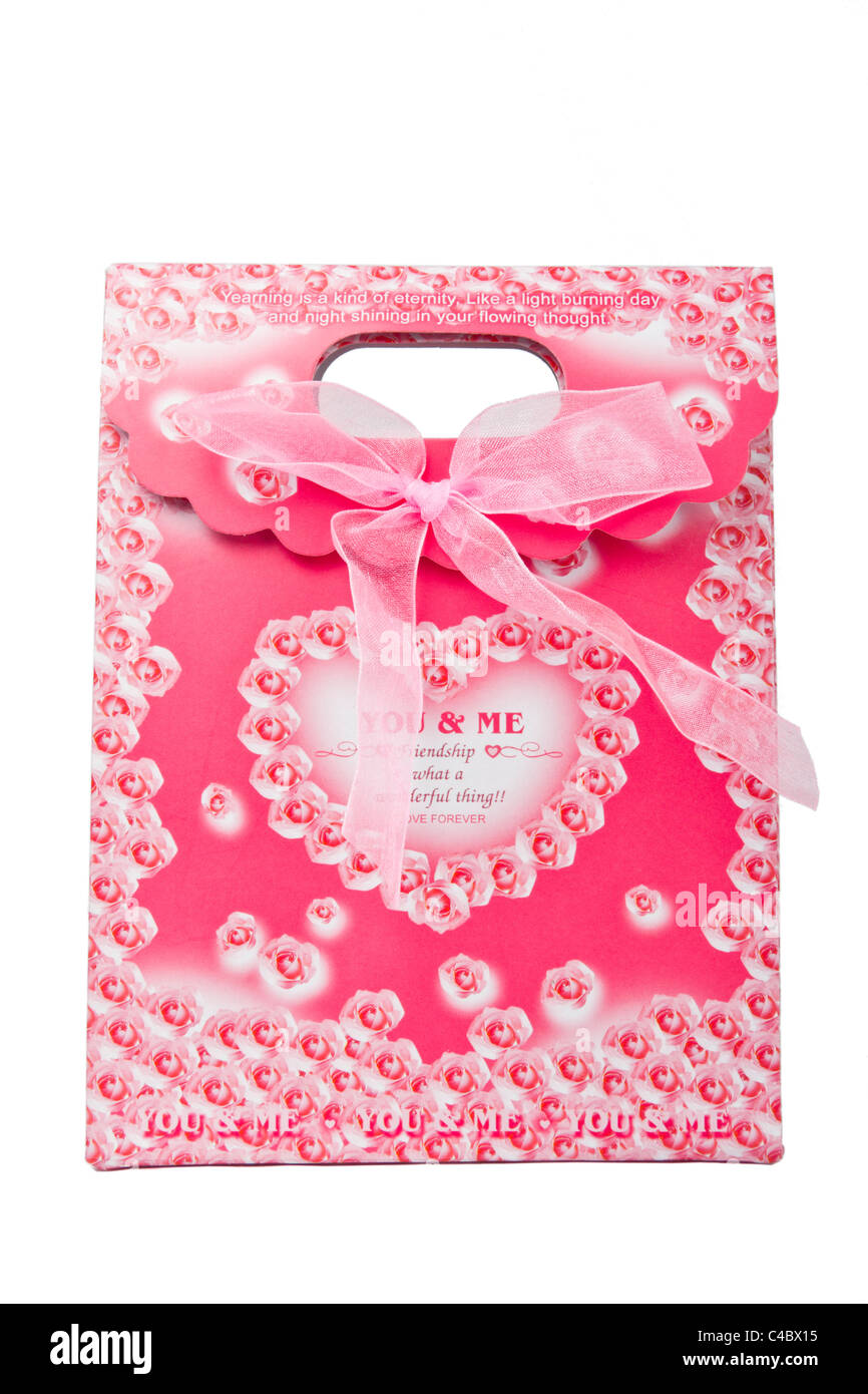 a colorful gift bag isolated on white Stock Photo - Alamy