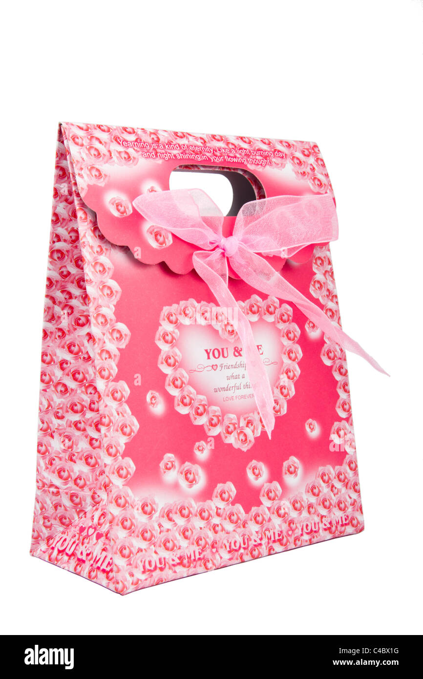 a colorful gift bag isolated on white Stock Photo - Alamy