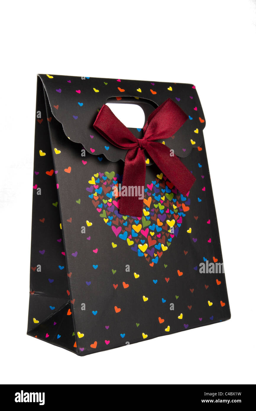 a colorful gift bag isolated on white Stock Photo - Alamy
