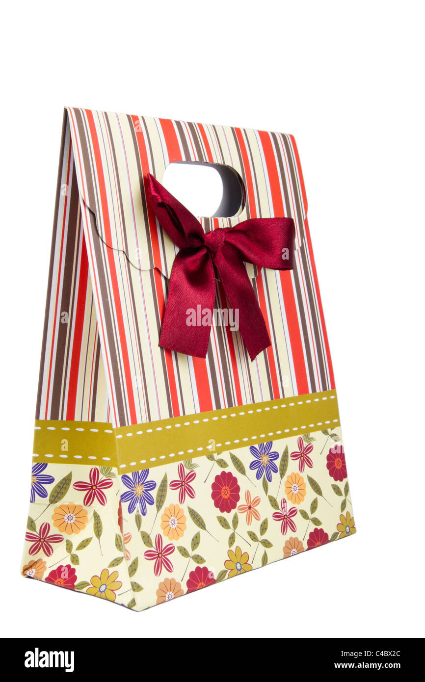 a colorful gift bag isolated on white Stock Photo - Alamy