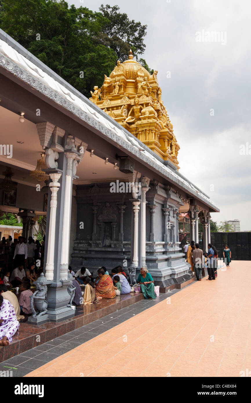 Detail of temple and local people during traditional lunch next to Batu ...