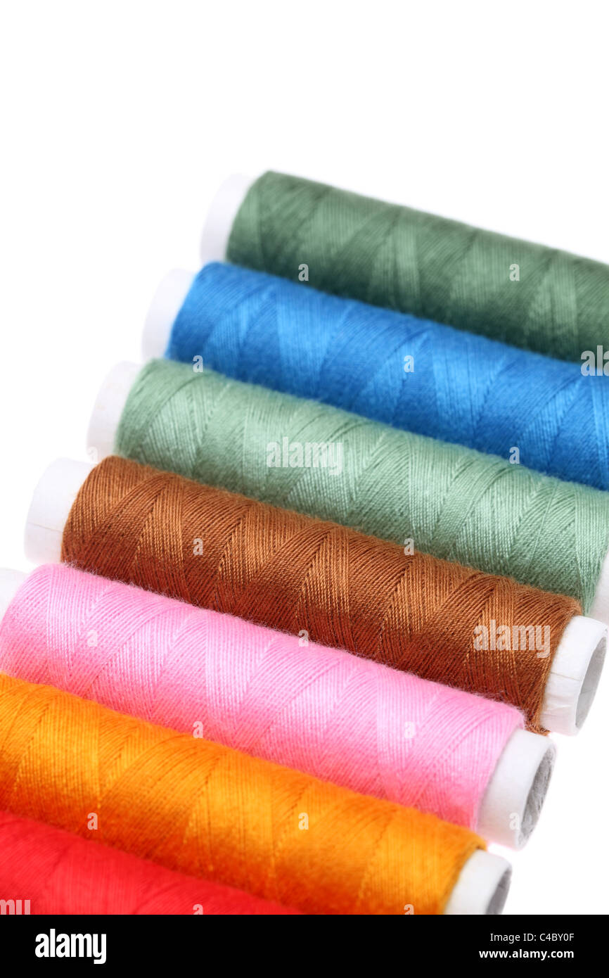 Colorful thread isolated on white background Stock Photo - Alamy