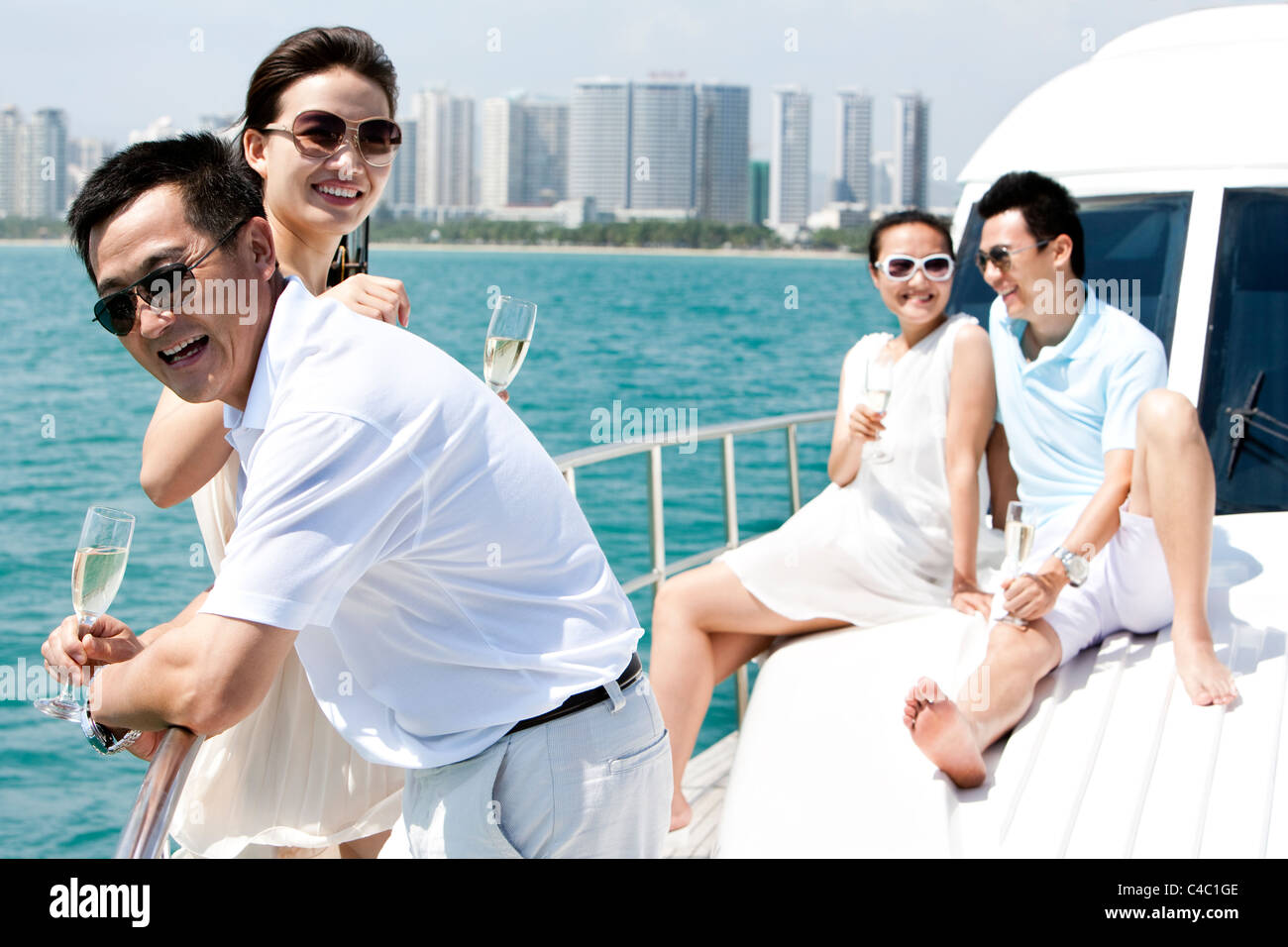 Friends Relaxing on a Yacht Stock Photo - Alamy