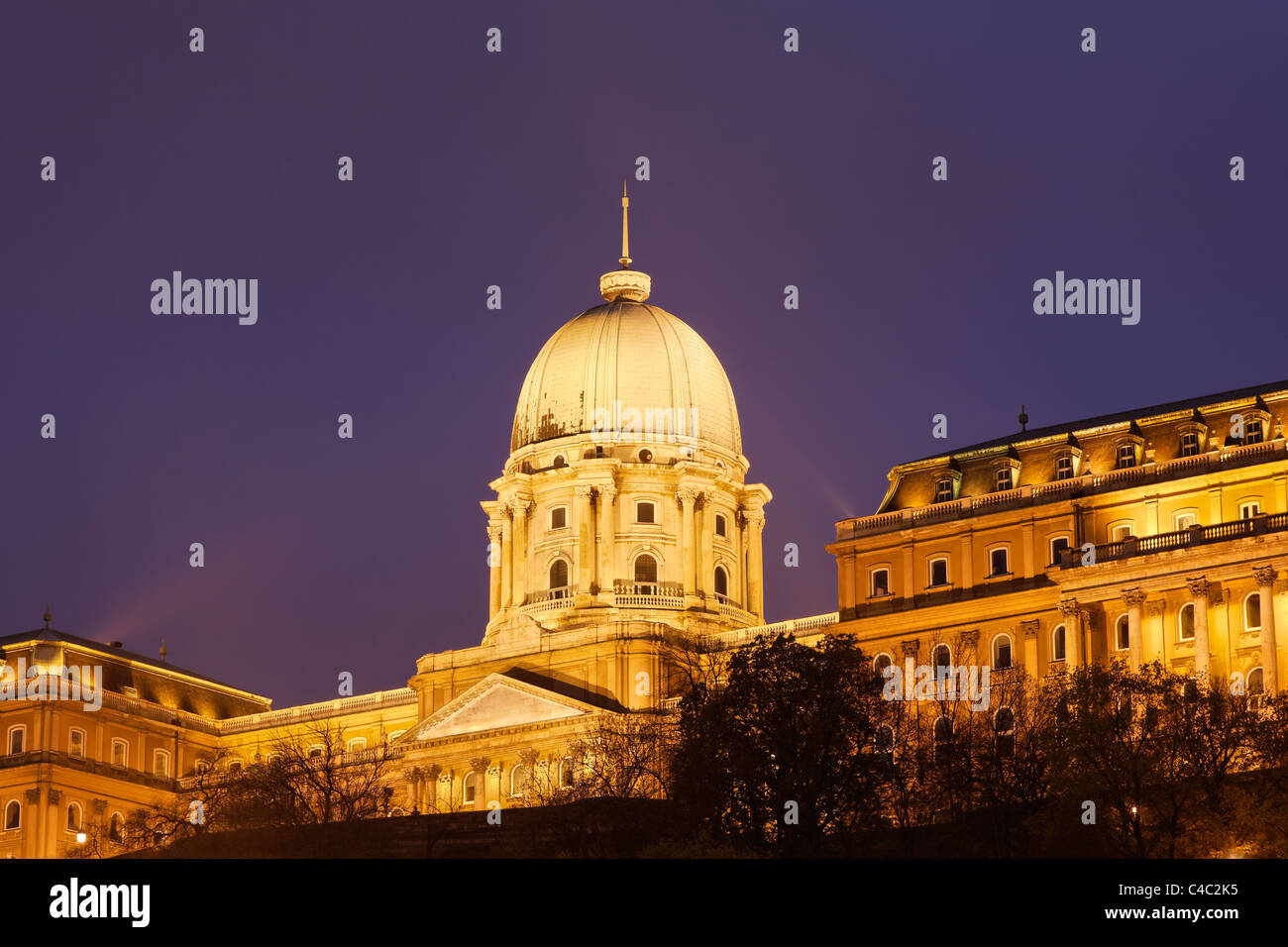 Columned building lit up at night Stock Photo - Alamy