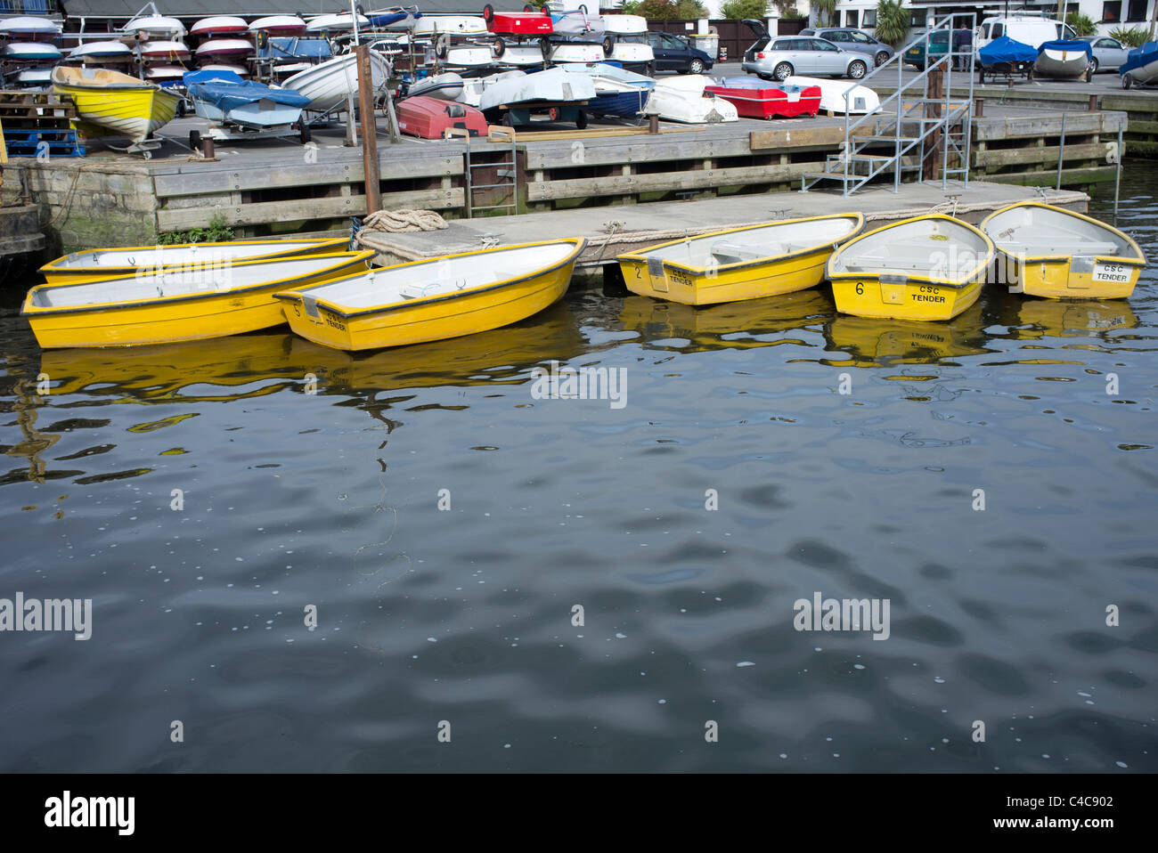 yellow rowing boats Stock Photo - Alamy