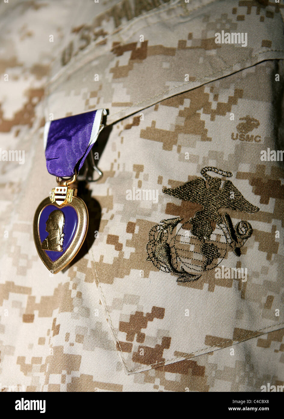 marine wears his Purple Heart on his digital camouflage minutes after ...