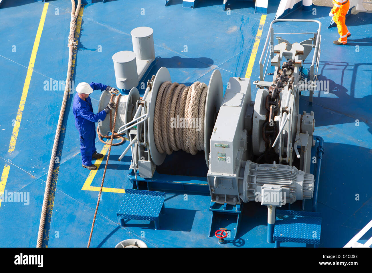 seaman seamen deckhands working work ship winch ropes warps Stock Photo ...