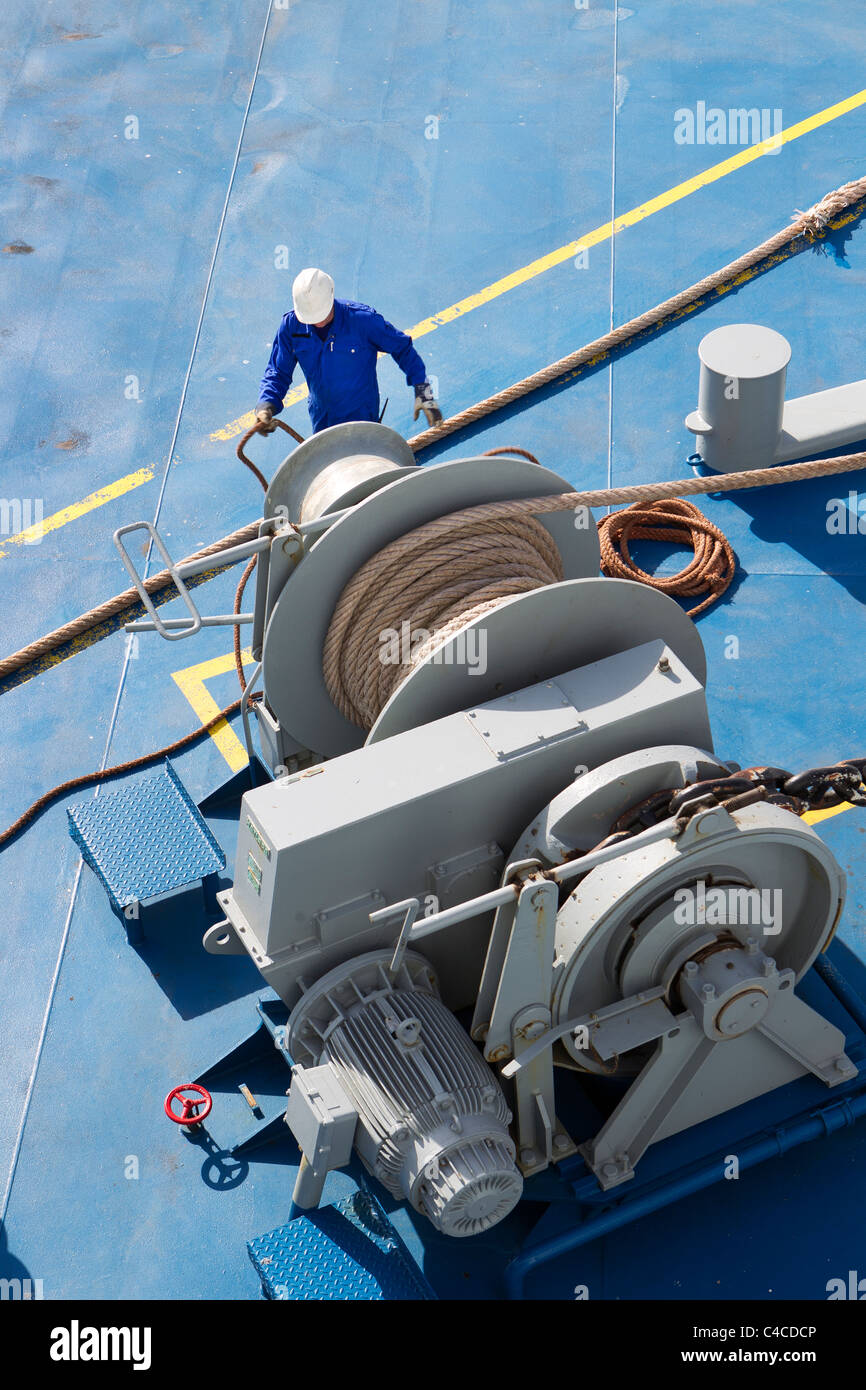 seaman seamen deckhands working work ship winch ropes warps Stock Photo ...