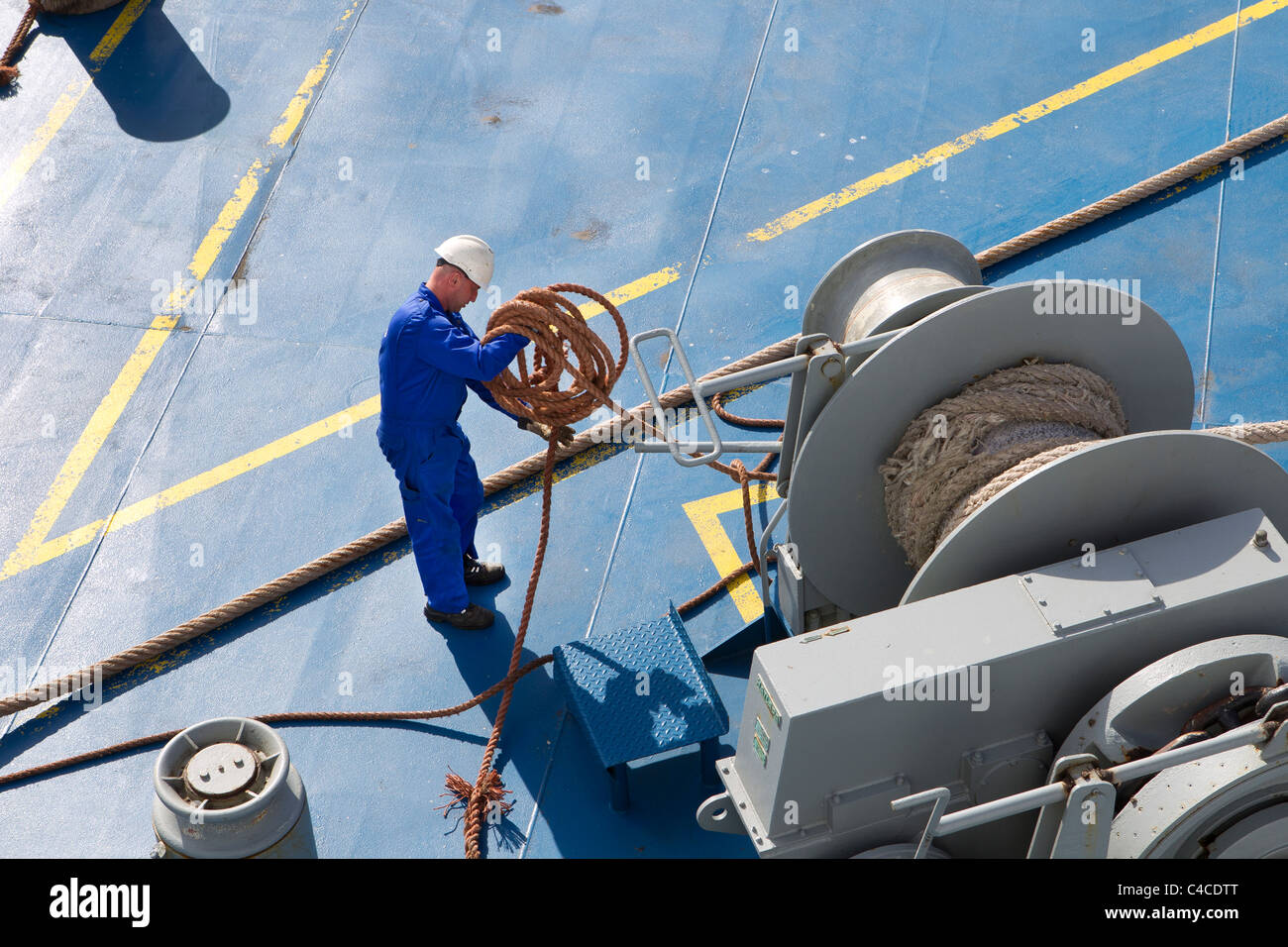 seaman seamen deckhands working work ship winch ropes warps Stock Photo ...