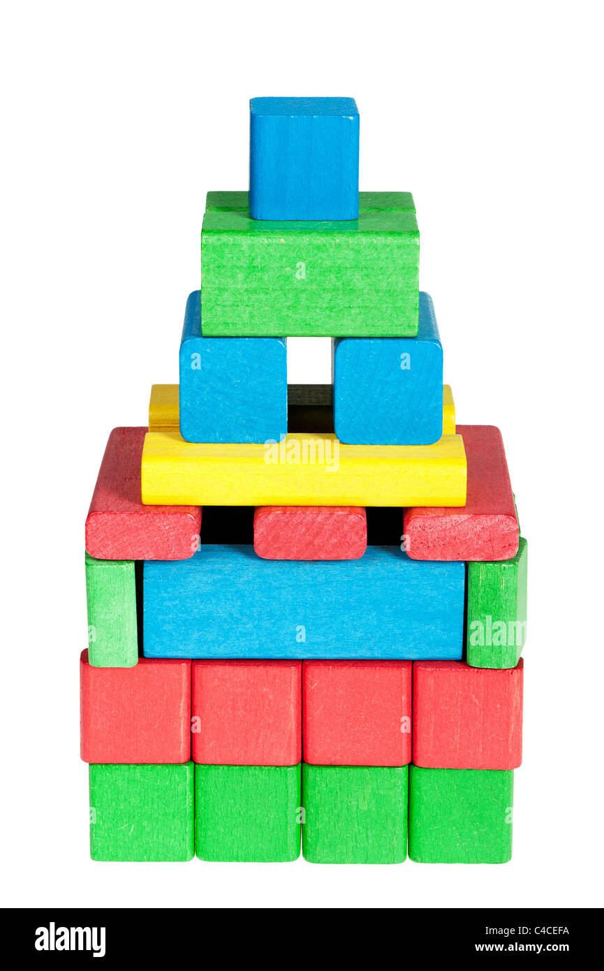Construction from colour wooden cubes. It is isolated on a white ...