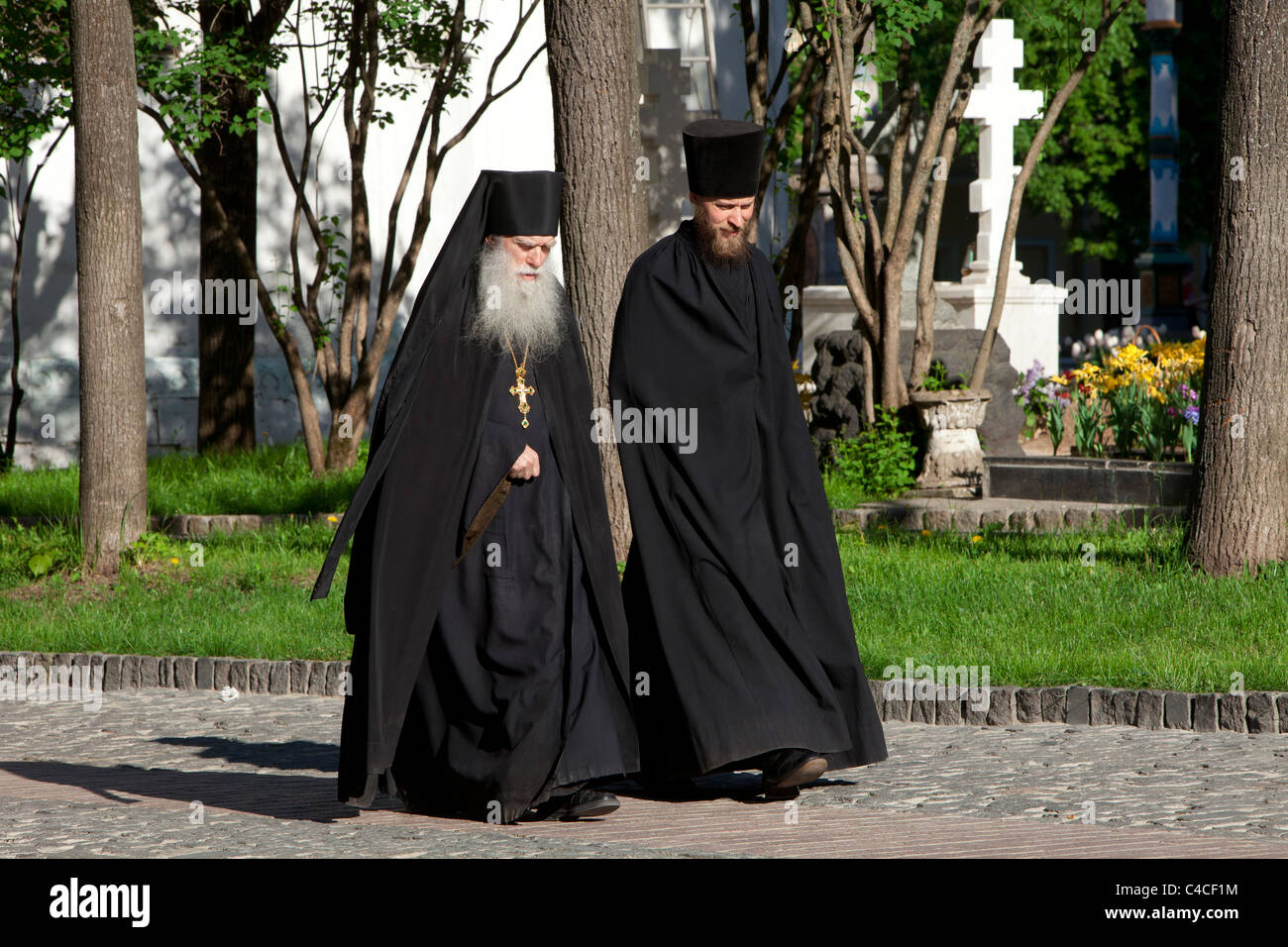 Two Russian Eastern Orthodox priests inside the Trinity Lavra of St ...